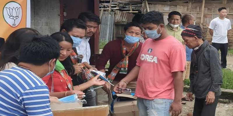 Arunachal: BJP ST Morcha distributed facemask, hand gloves and ...